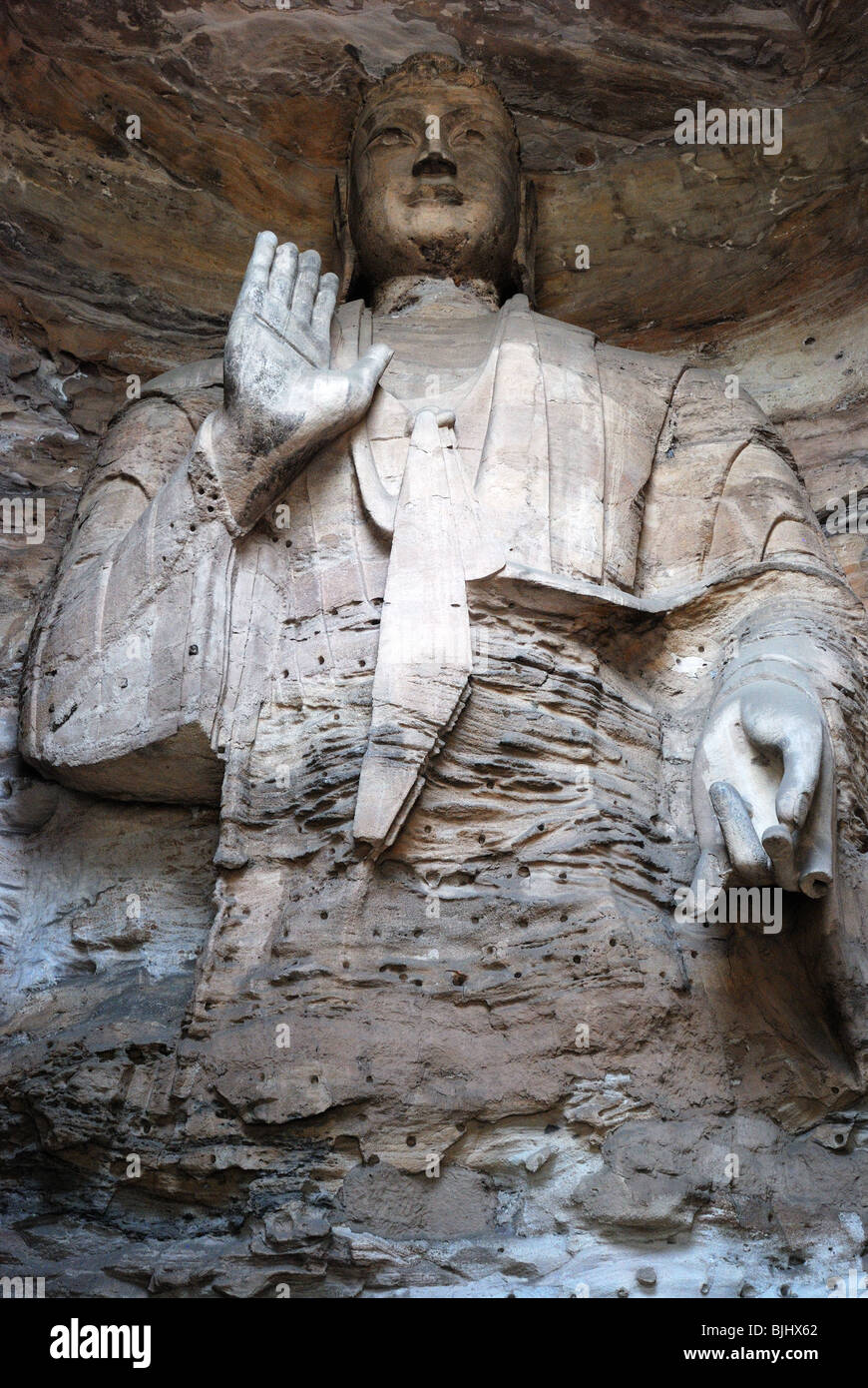 The Yungang Grottoes are ancient Buddhist temple grottoes near the city ...