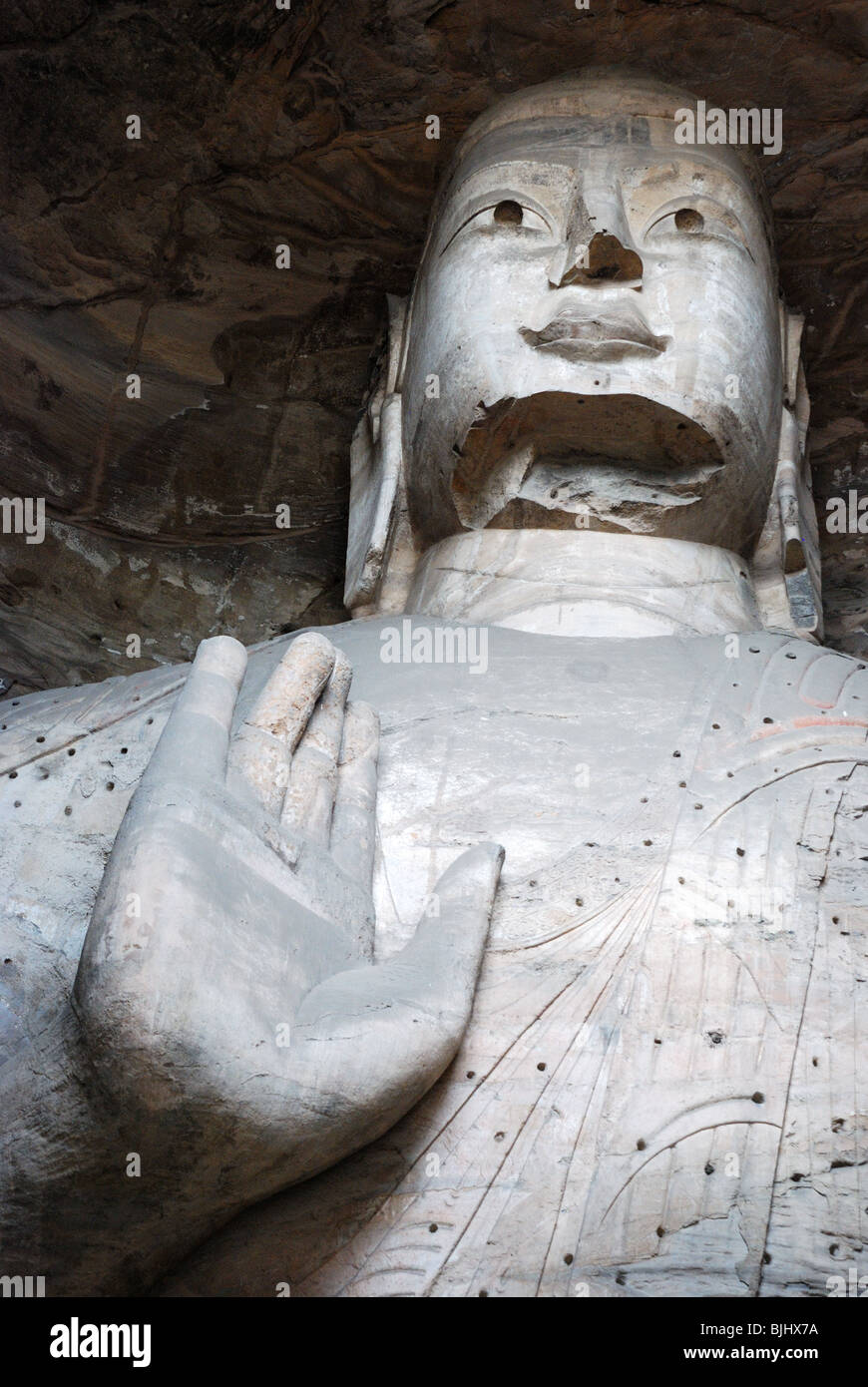 The Yungang Grottoes are ancient Buddhist temple grottoes near the city ...