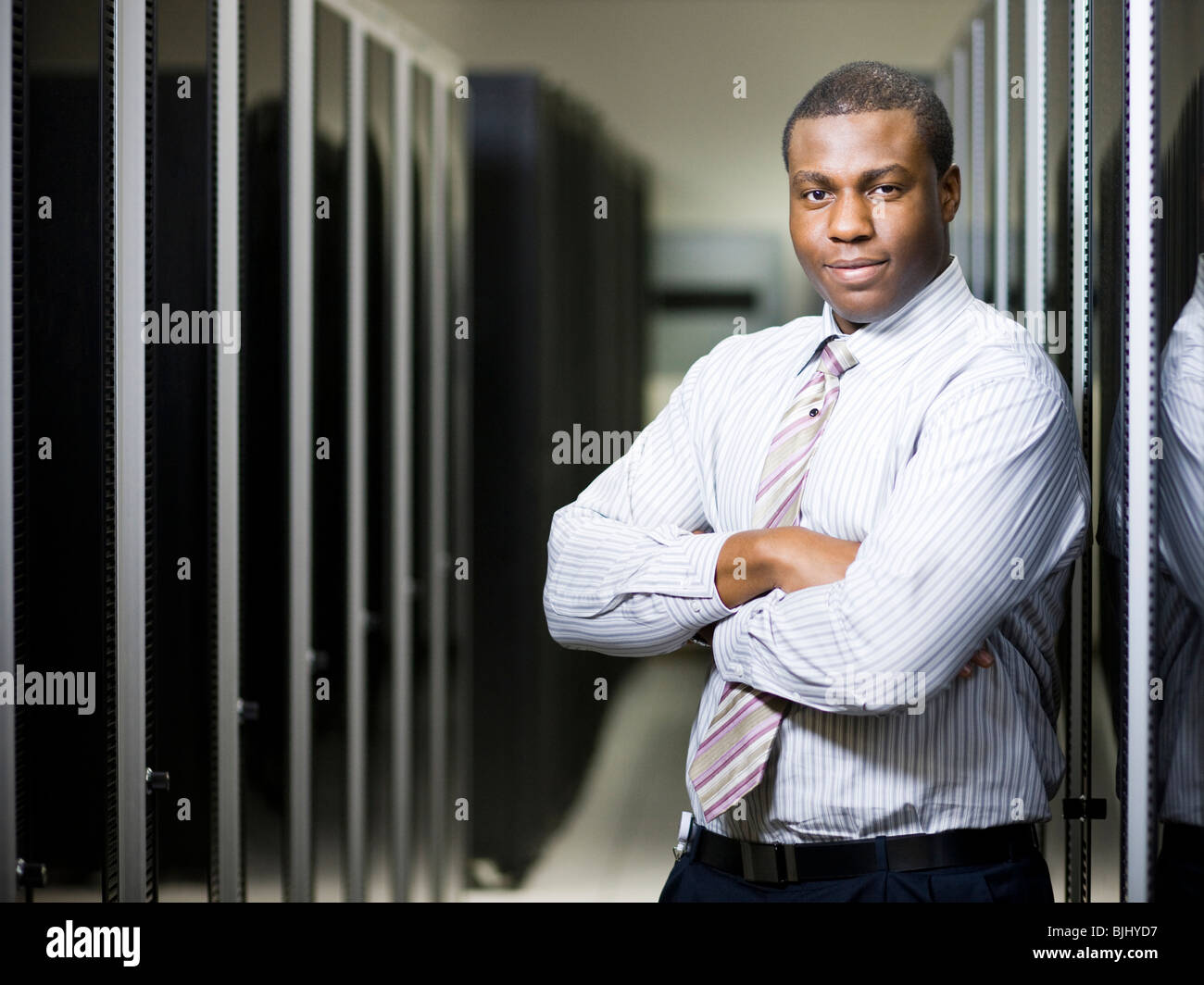 businessman in a server room Stock Photo - Alamy