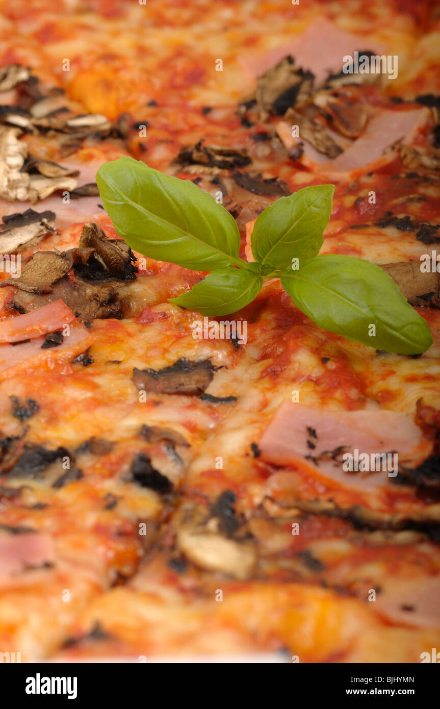 Fresh pizza with basil leaf Stock Photo - Alamy