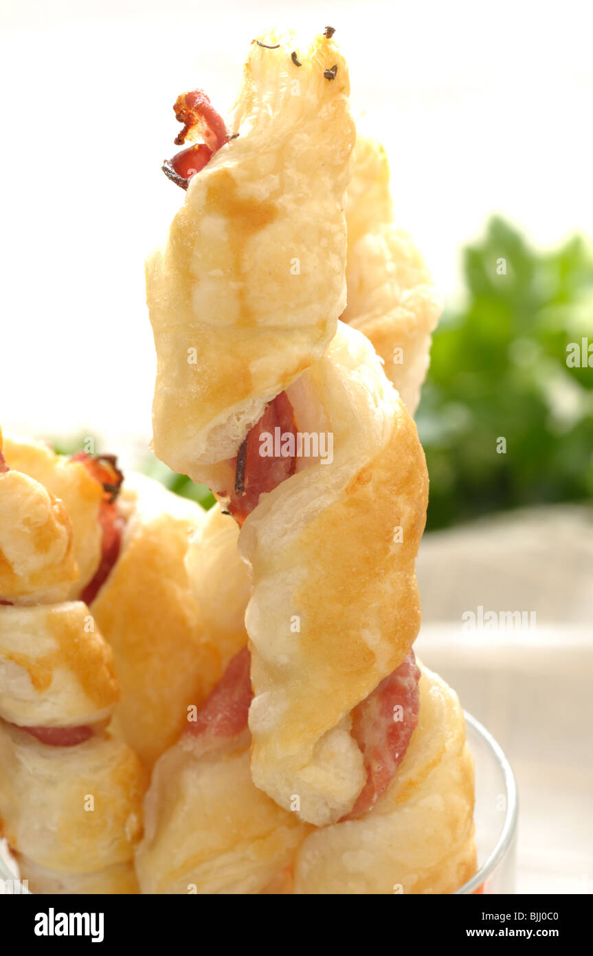 Puff pastry snacks with ham Stock Photo - Alamy