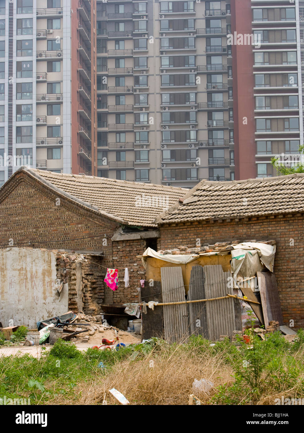 Detail of city street with garbage and urban blight Stock Photo - Alamy