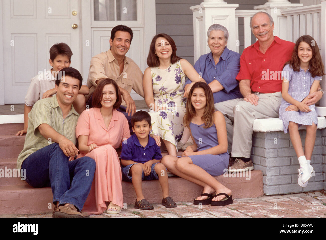 Family portrait on the porch Stock Photo - Alamy