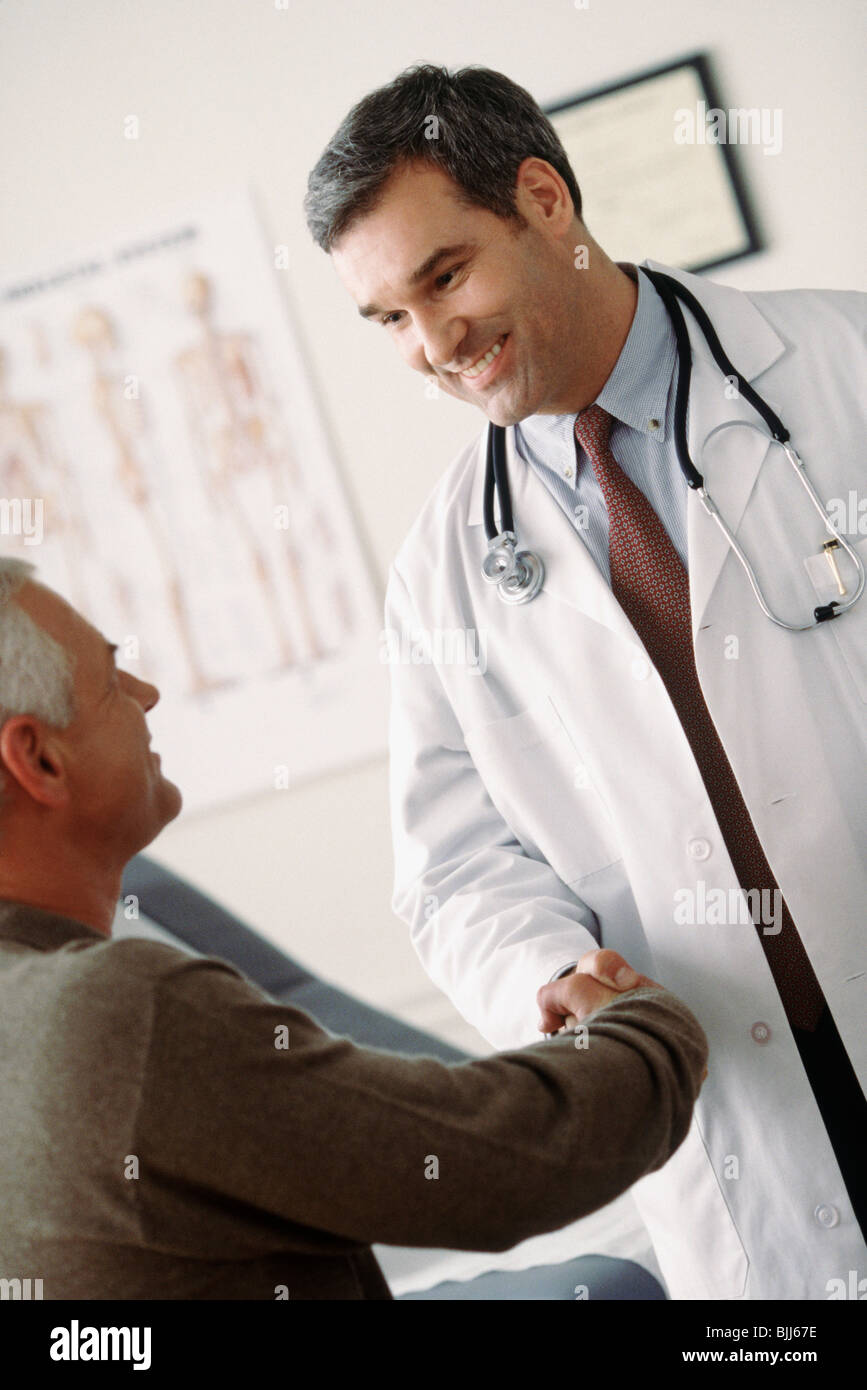 Doctor talking to patient Stock Photo - Alamy