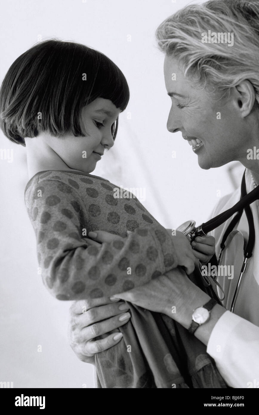 Child having check-up at doctor's office Stock Photo - Alamy