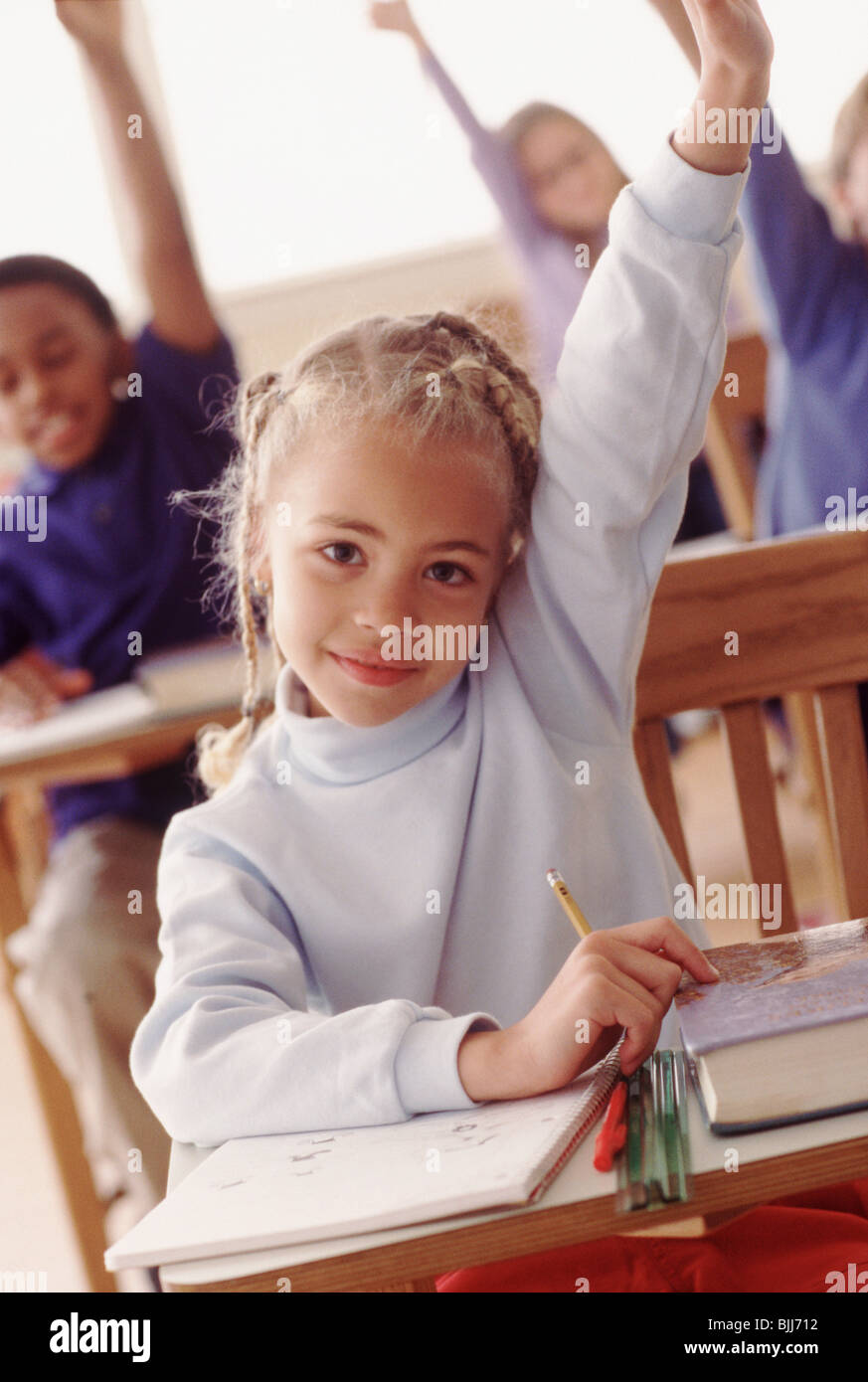 Hands up classroom hi-res stock photography and images - Alamy
