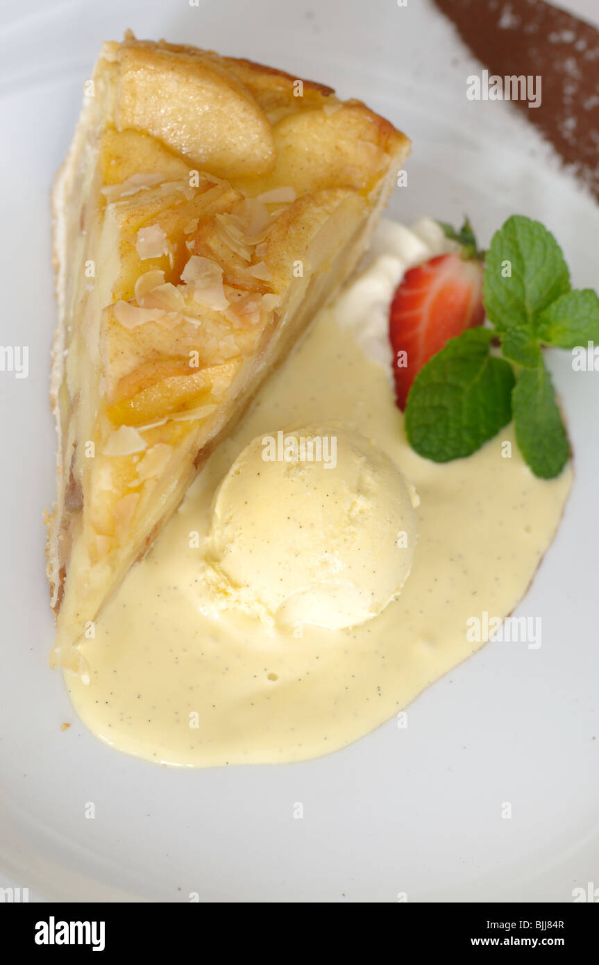 Traditional polish apple pie "Szarlotka" served hot with ice cream ...