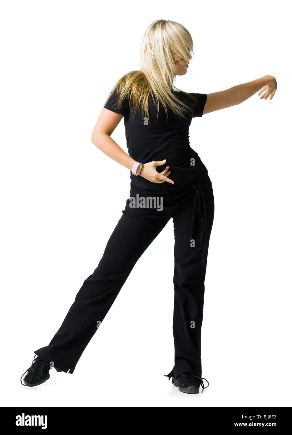 Woman dancing and smiling Stock Photo - Alamy