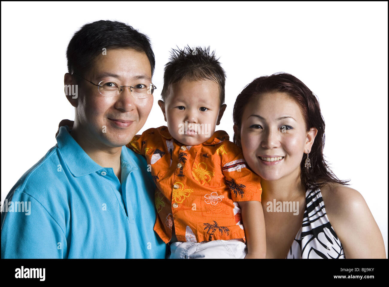 Asian parents with young boy Stock Photo - Alamy