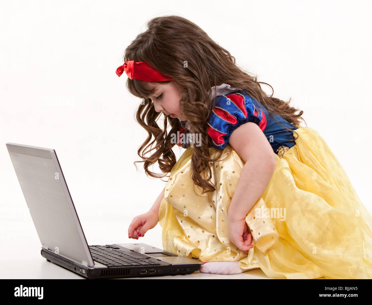 Young cute caucasian toddler girl playing pretend Stock Photo - Alamy