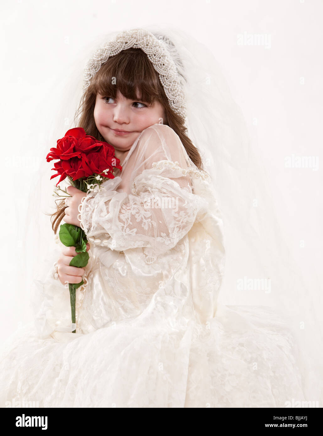Young cute caucasian toddler girl playing pretend Stock Photo - Alamy