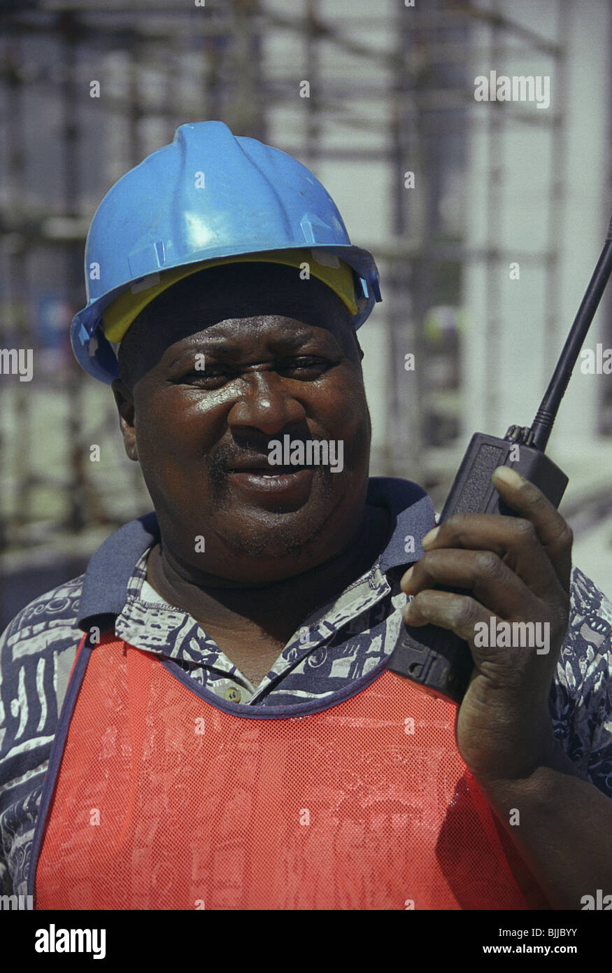Supervisor with walkie talkie Stock Photo - Alamy
