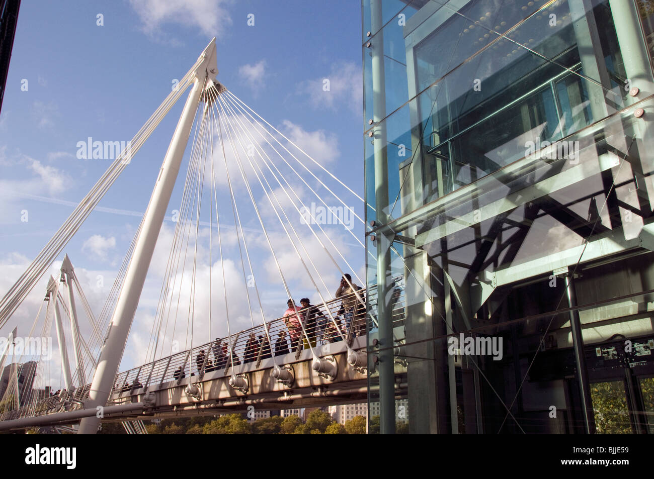 LONDON FOOT BRIDGE ON THAMES RIVER BY SOUTH BANK CENTRE UK Stock Photo ...
