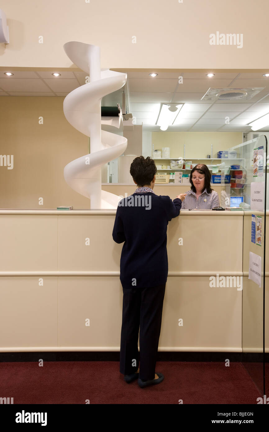 A patient collecting their prescription Stock Photo - Alamy