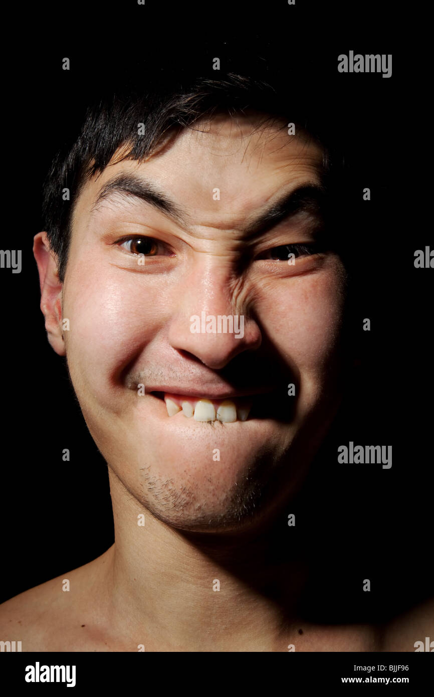 Bitten lower lip hi-res stock photography and images - Alamy