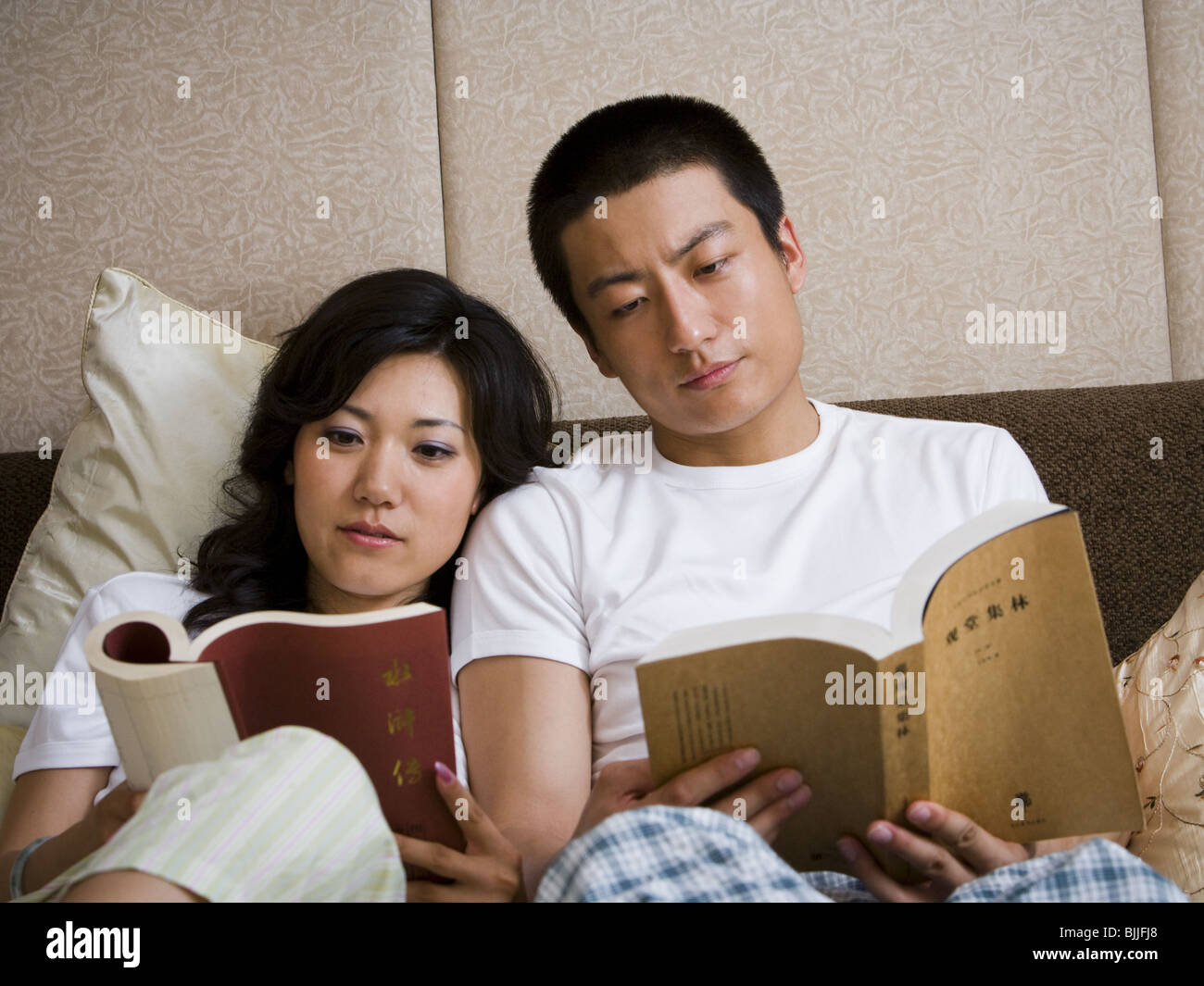 Romance couples reading together hi-res stock photography and images ...