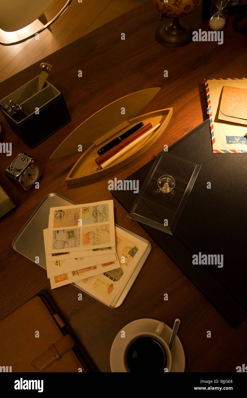Postage stamps on desk Stock Photo - Alamy
