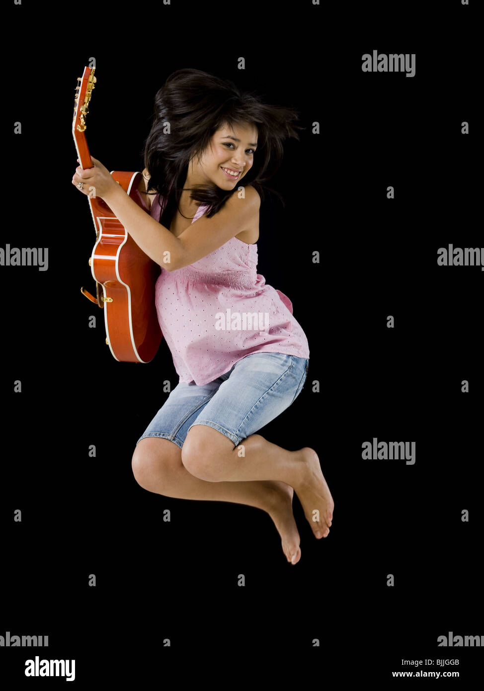 Women dancing playing musical instruments hi-res stock photography and ...