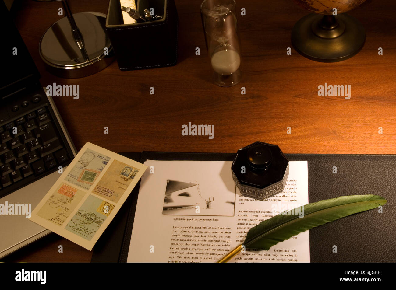 Quill pen and document on desk Stock Photo - Alamy