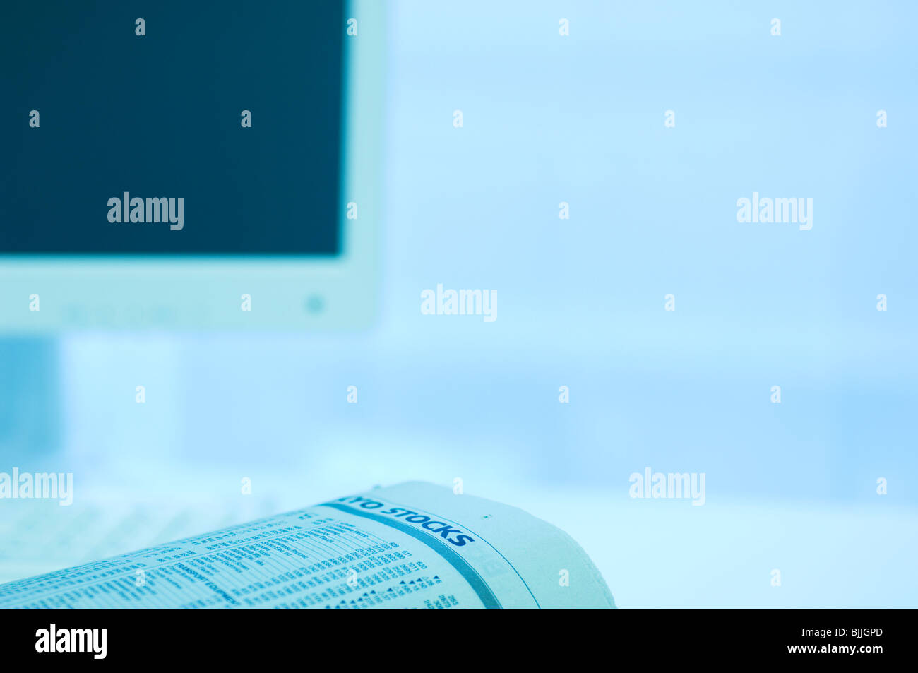 Computer with newspaper Stock Photo - Alamy