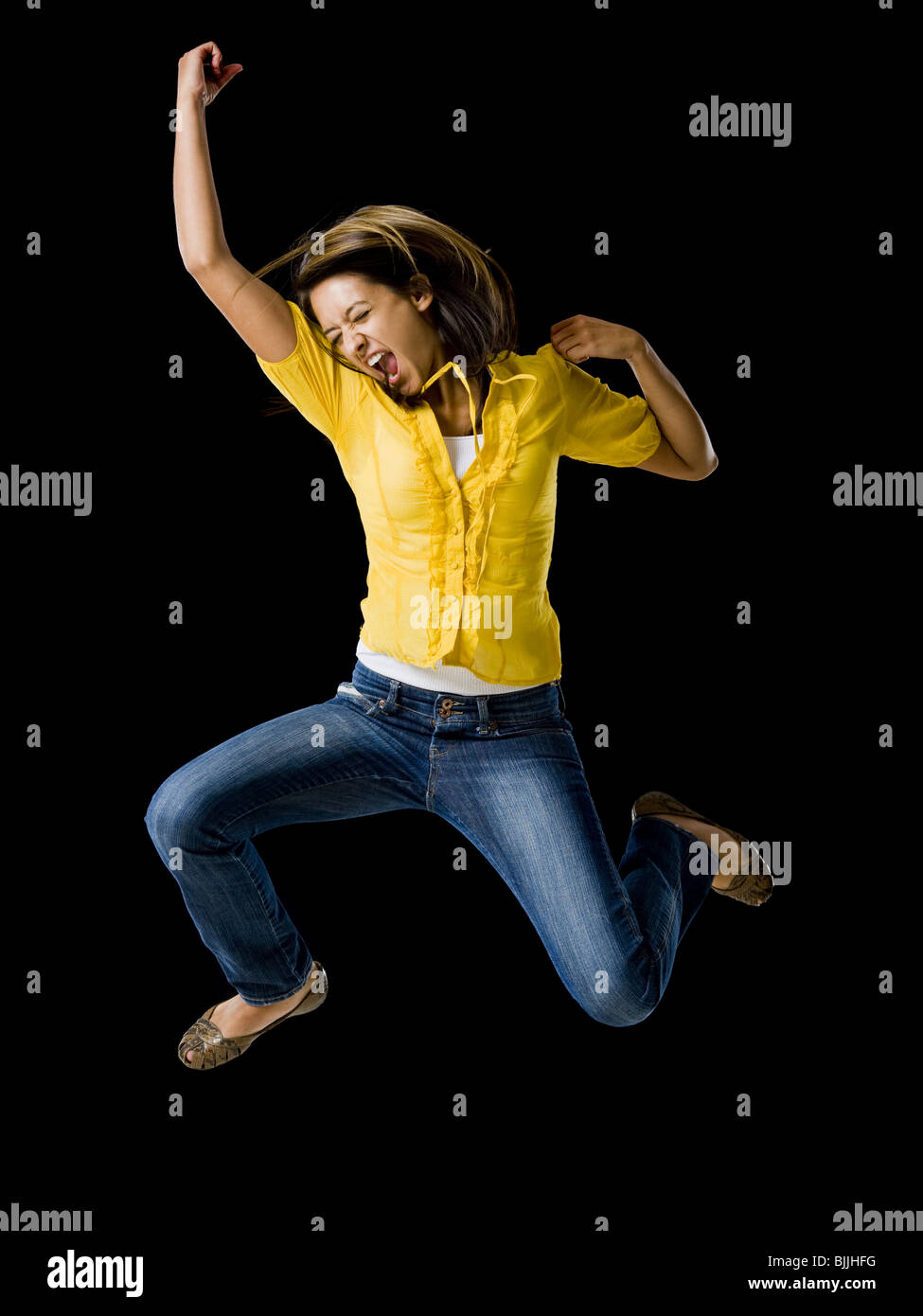 Arms up leaping hi-res stock photography and images - Alamy