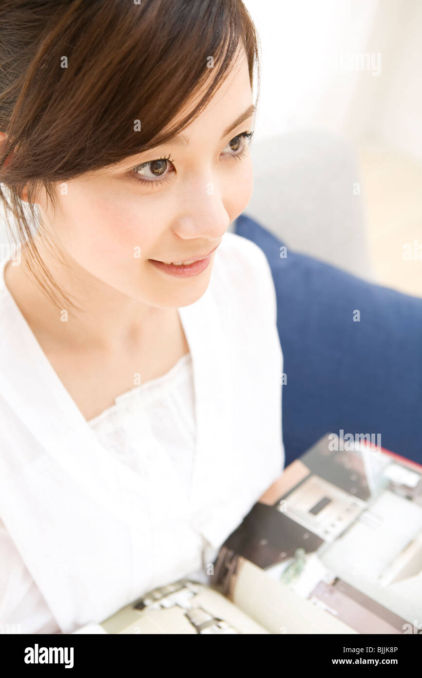 Young asian woman reading book hi-res stock photography and images - Alamy