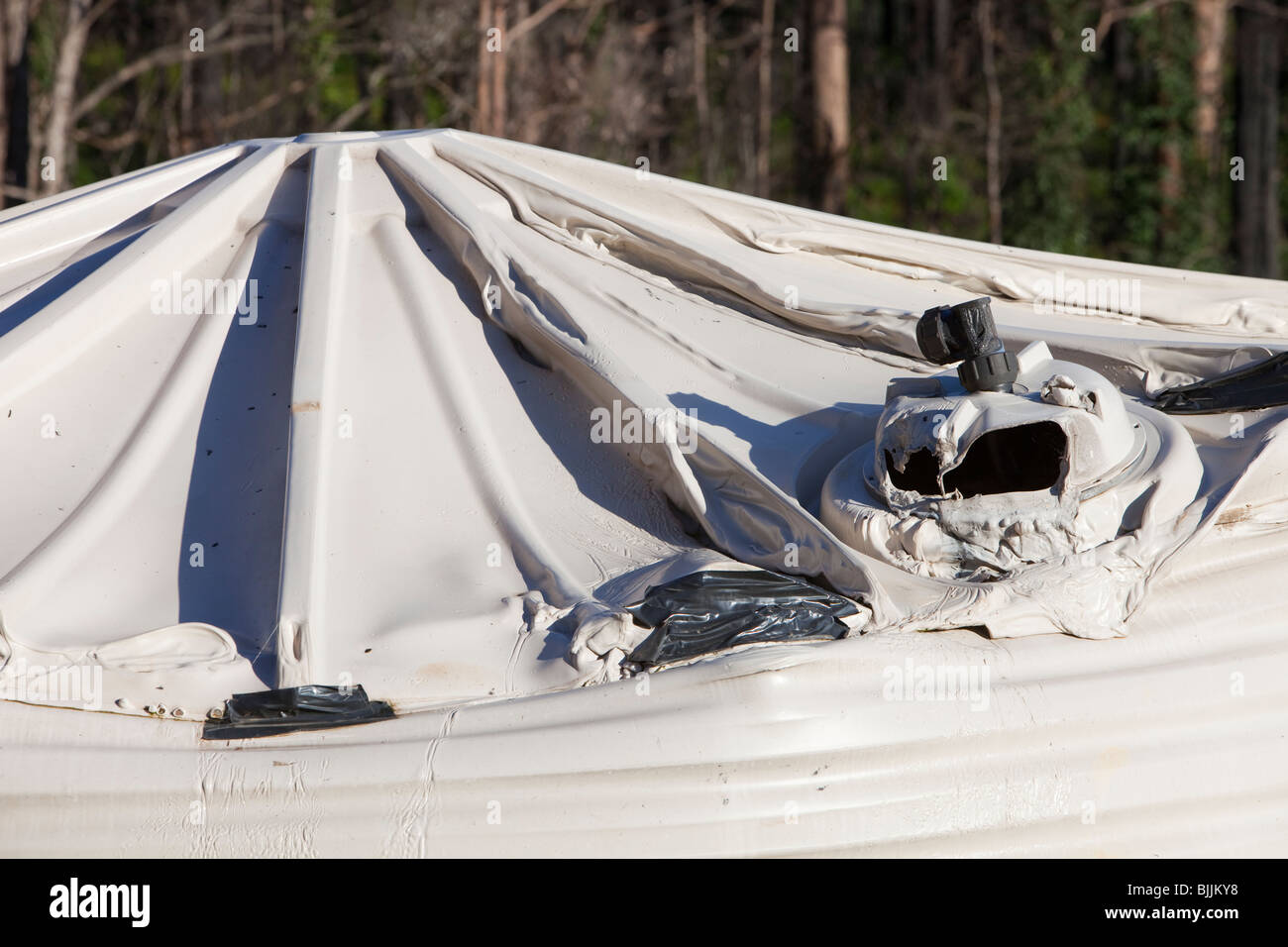 A water tank that was melted by the intense heat of the bush fires in ...