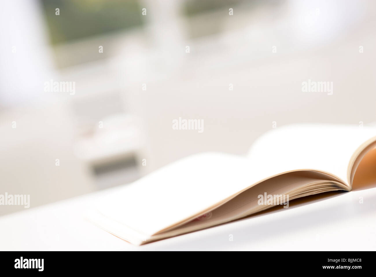 Book with blank pages in classroom Stock Photo - Alamy