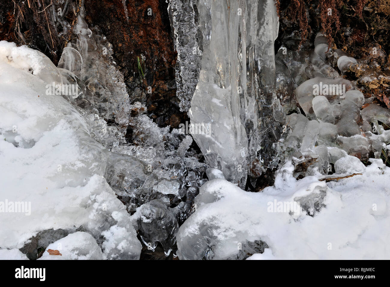 Large icicle and ice formations in deeply frozen stream Stock Photo - Alamy