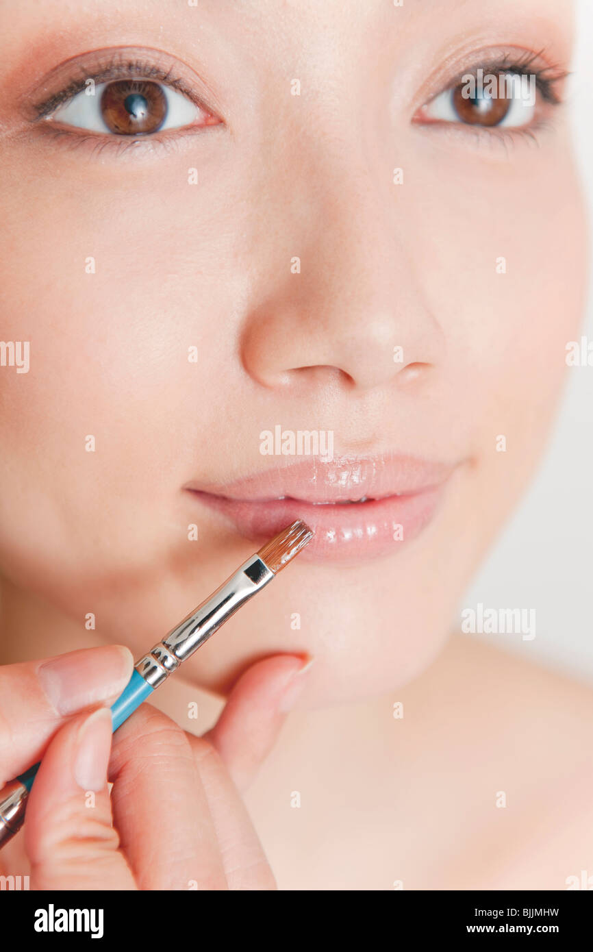 Applying lipstick hi-res stock photography and images - Alamy