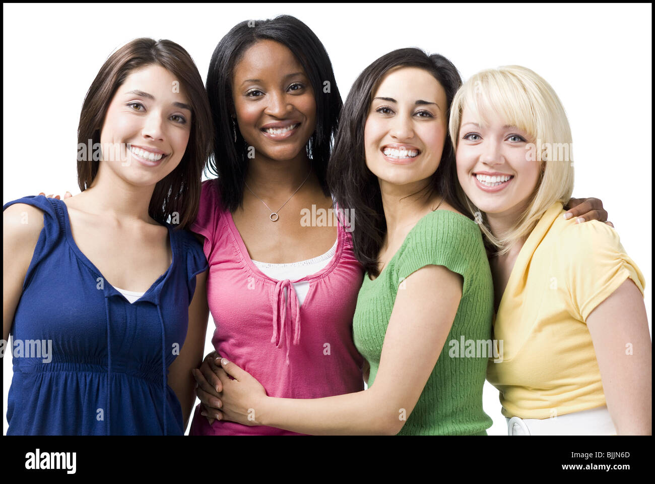 Four women hugging and smiling Stock Photo - Alamy