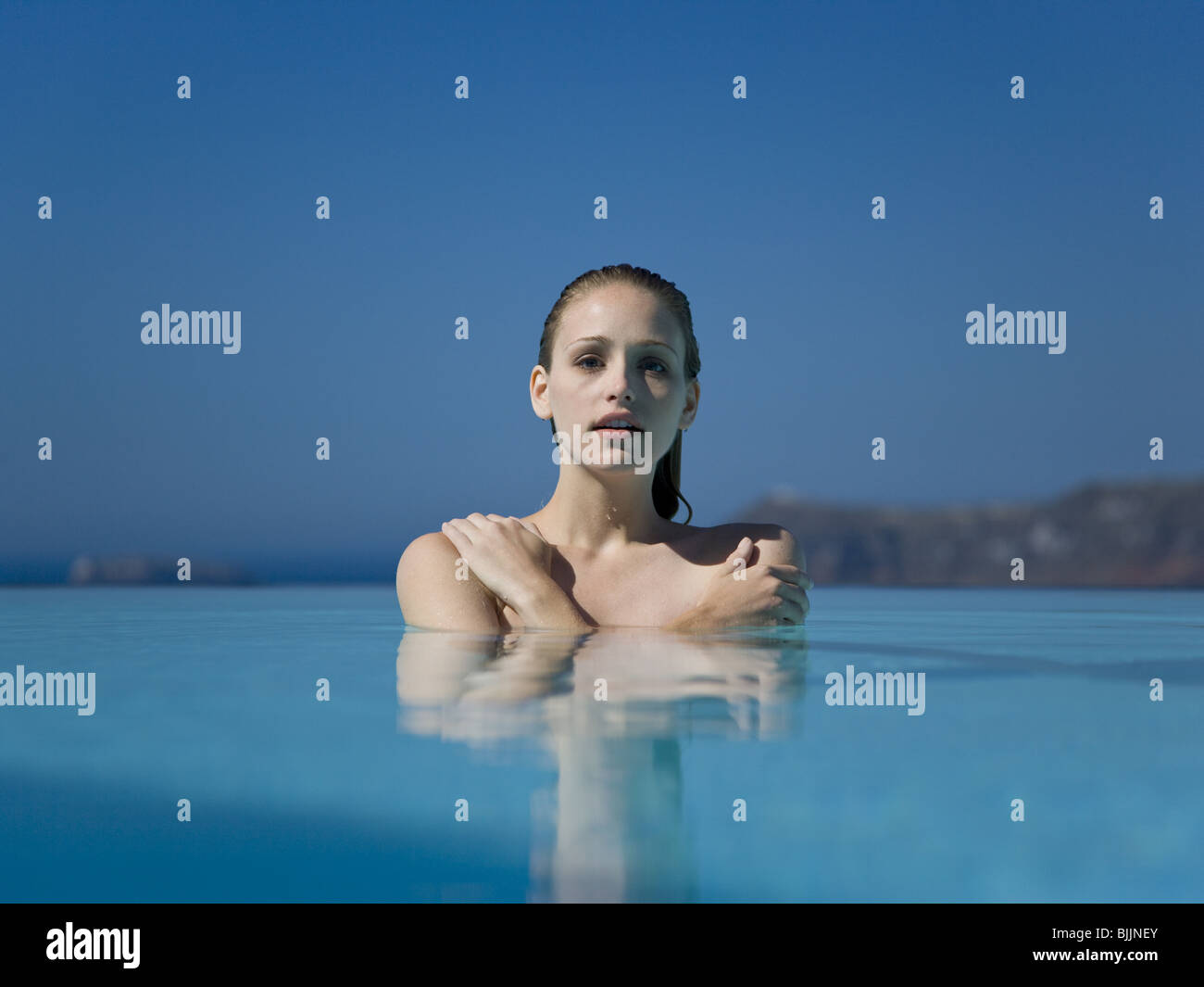 Woman in pool outdoors Stock Photo - Alamy