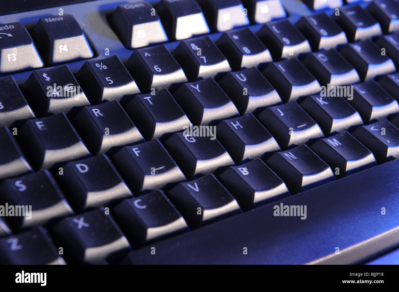 Querty computer keyboard in black Stock Photo - Alamy