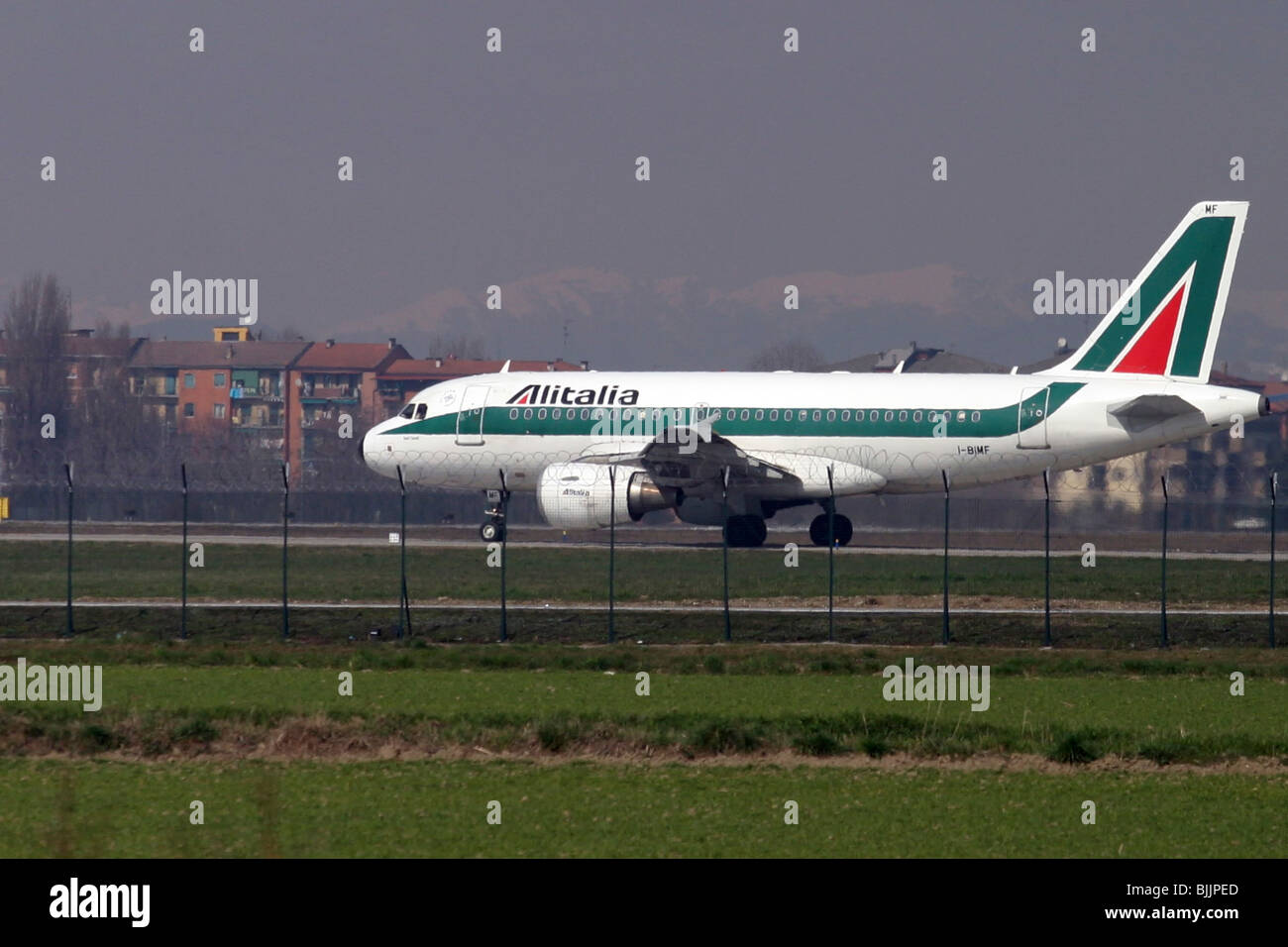 Italy, Milan, Linate Airport, Alitalia passenger jet at takeoff Stock ...