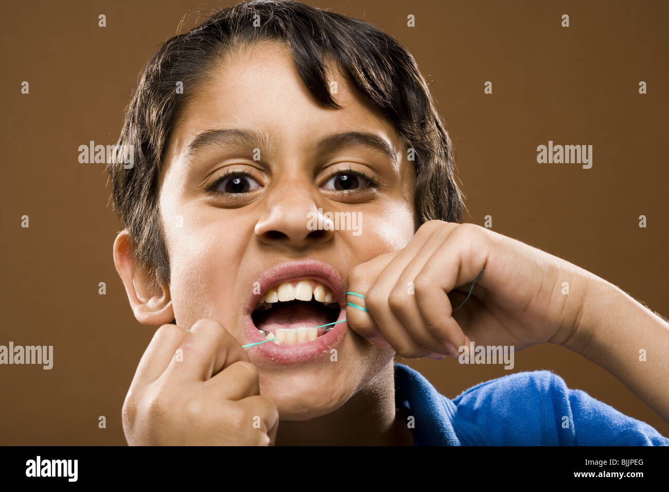 Child flossing hi-res stock photography and images - Alamy