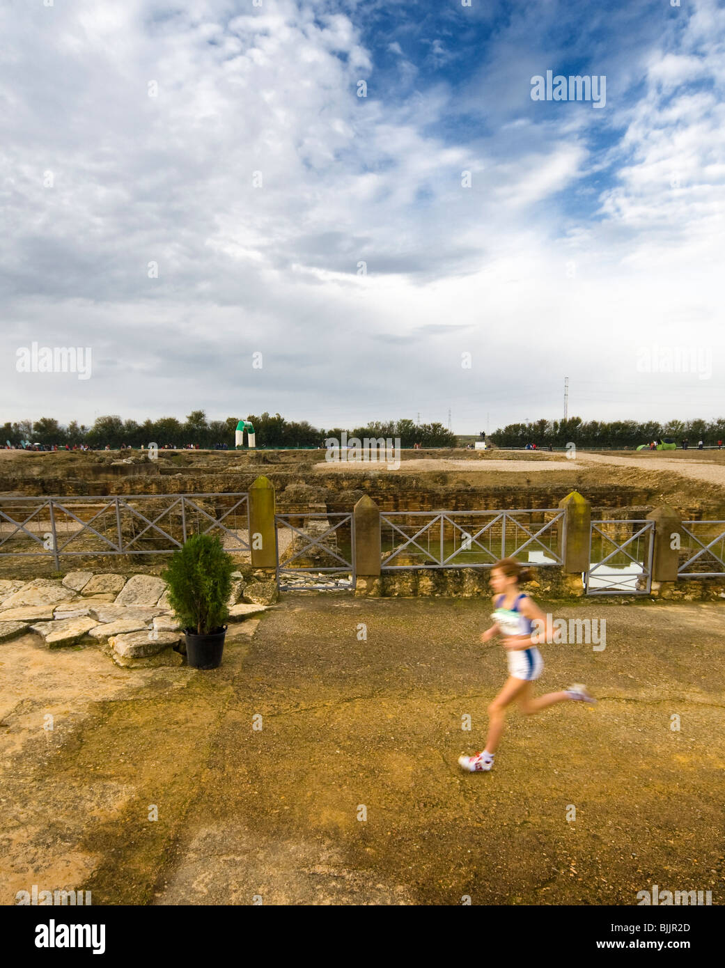 Runner in a international race of cross Stock Photo - Alamy