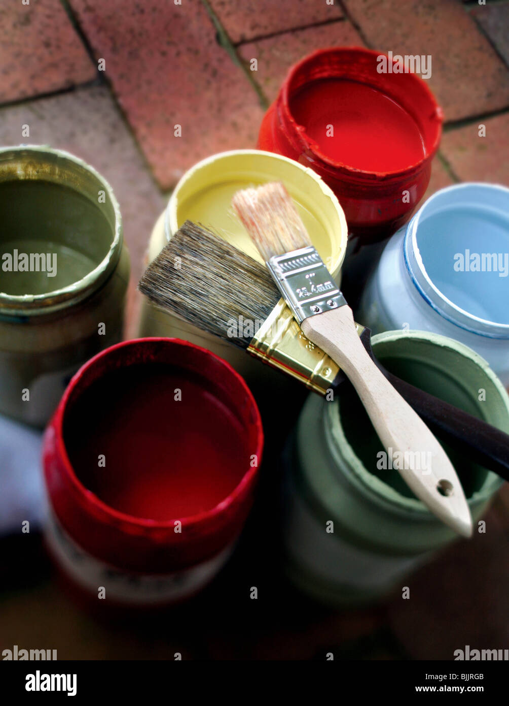 Red blue yellow green paint pots hi-res stock photography and images ...