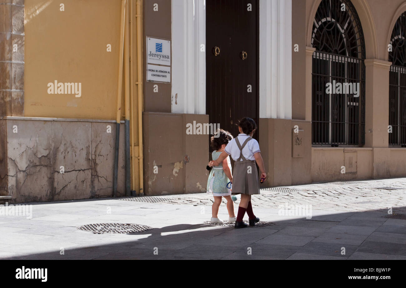 Children girls kids walking street hi-res stock photography and images ...