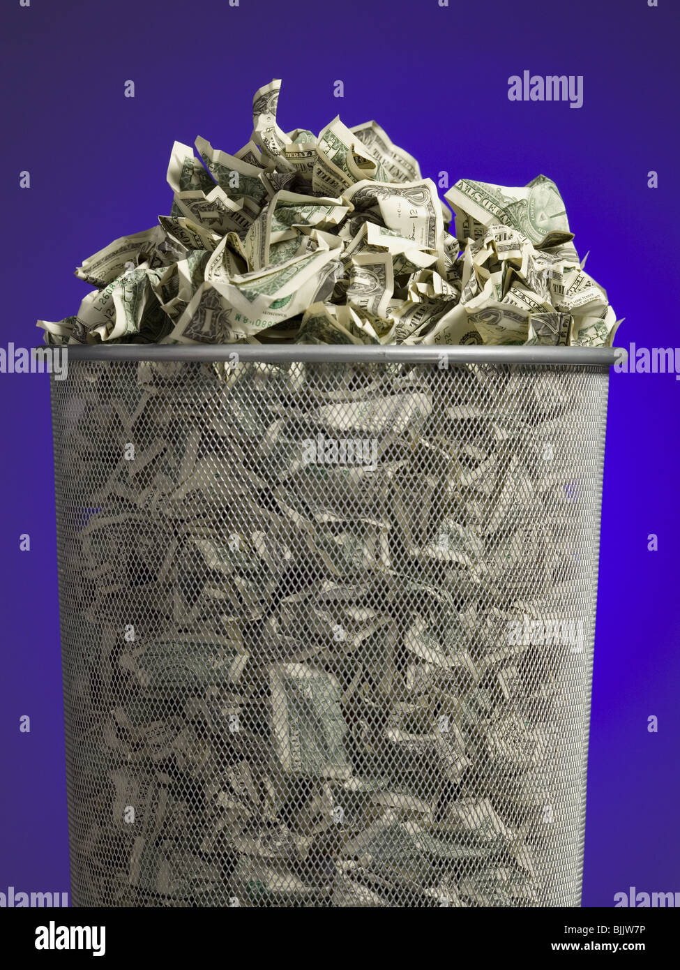 Crumpled up dollar bills hi-res stock photography and images - Alamy