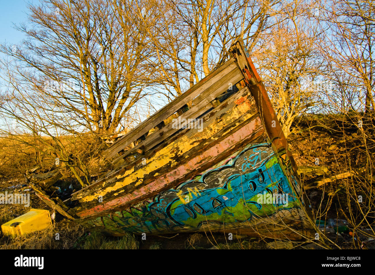 Graffiti on old boat beside the River Ribble in Preston, Lancashire ...