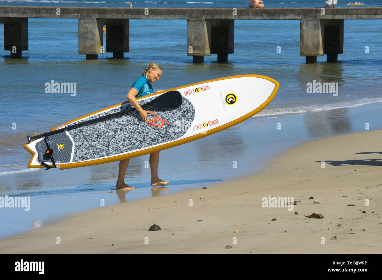 Paddleboard young blonde woman hi-res stock photography and images - Alamy