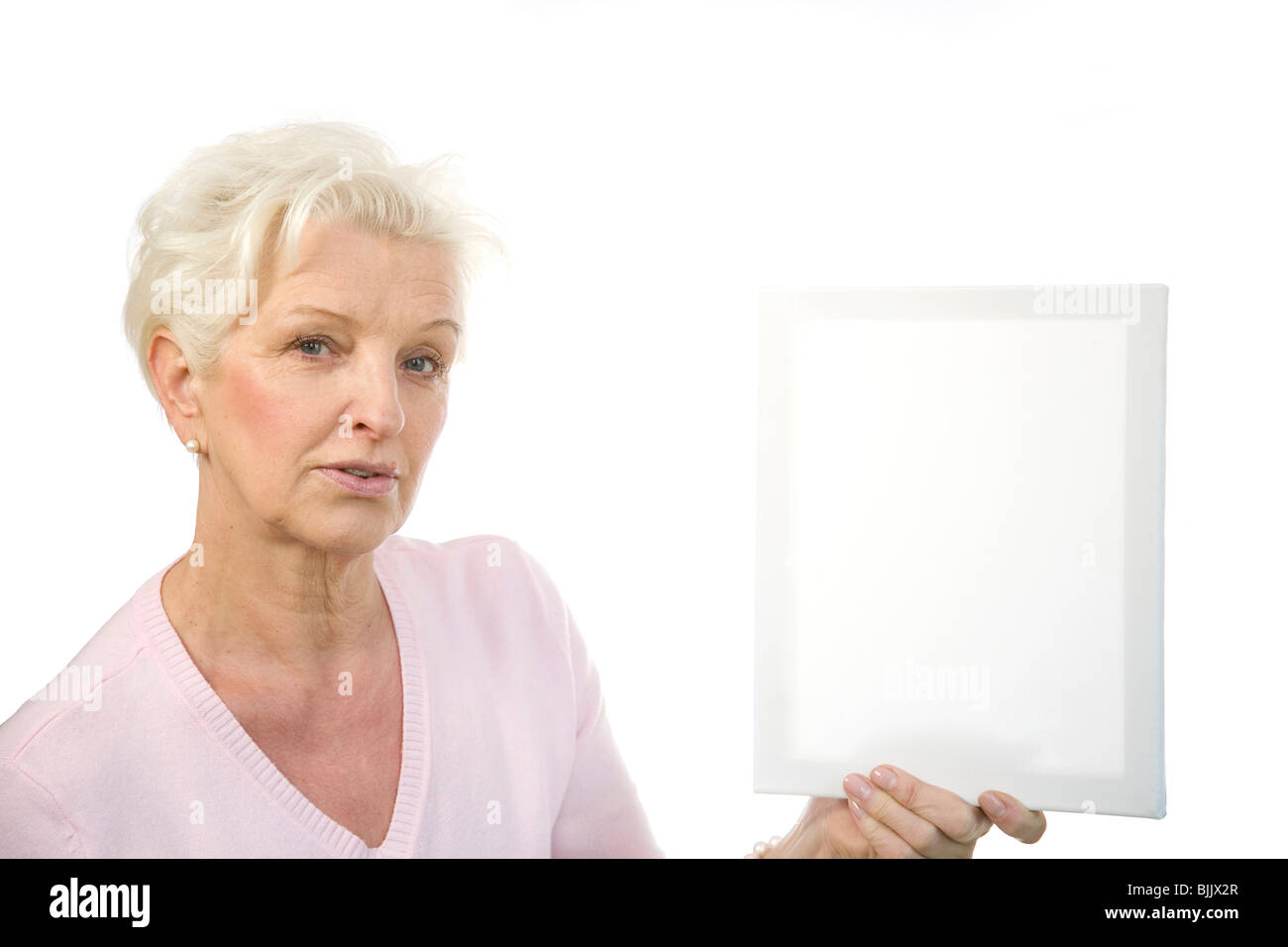 Woman holding up blank sign hi-res stock photography and images - Alamy