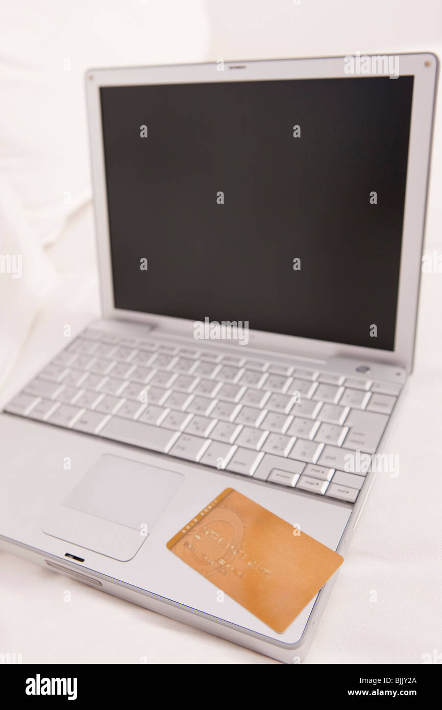 Computer and credit card Stock Photo - Alamy