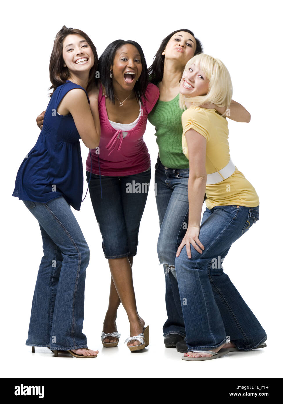 Four women hugging and smiling Stock Photo - Alamy