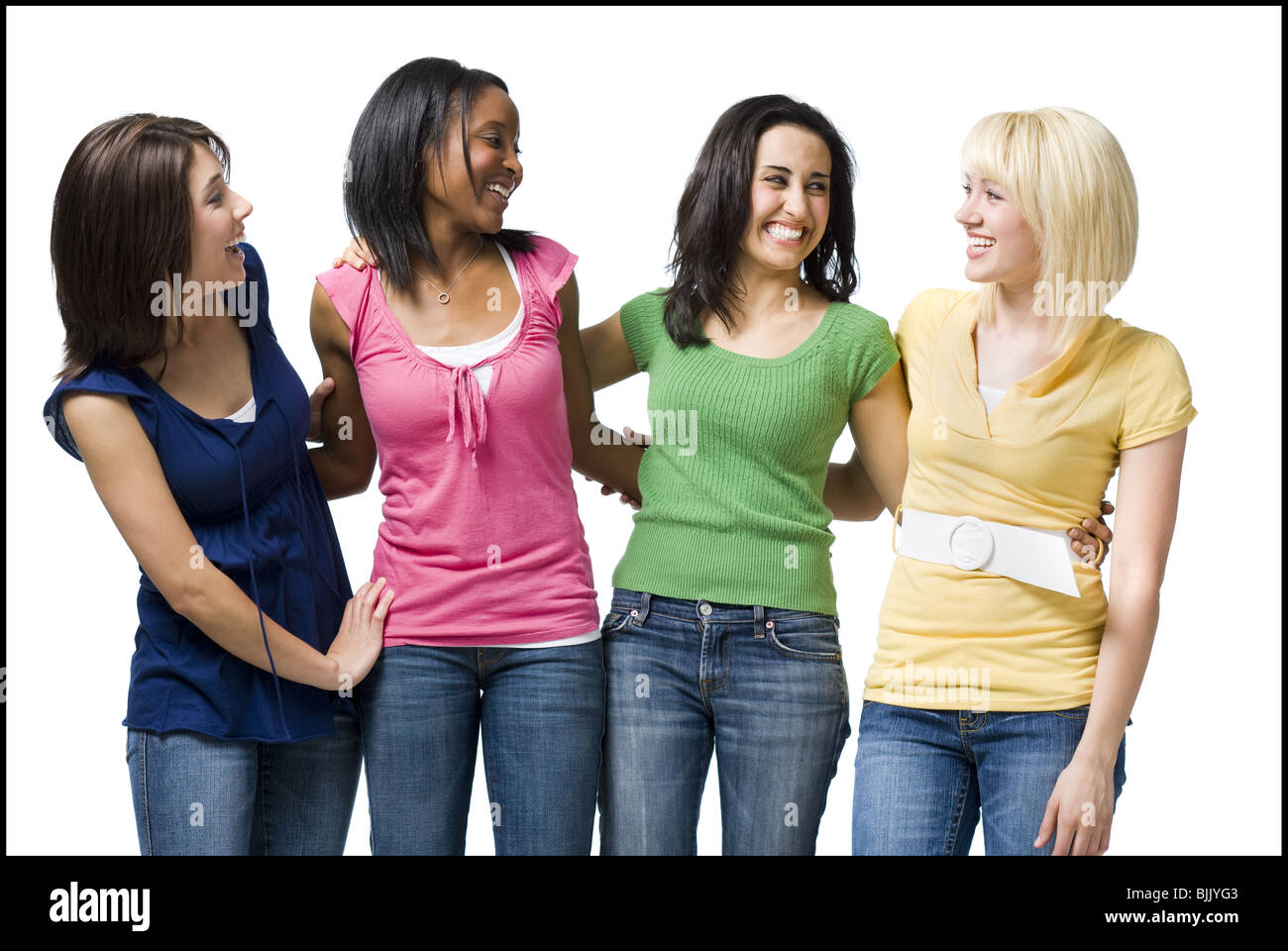 Four women hugging and smiling Stock Photo - Alamy