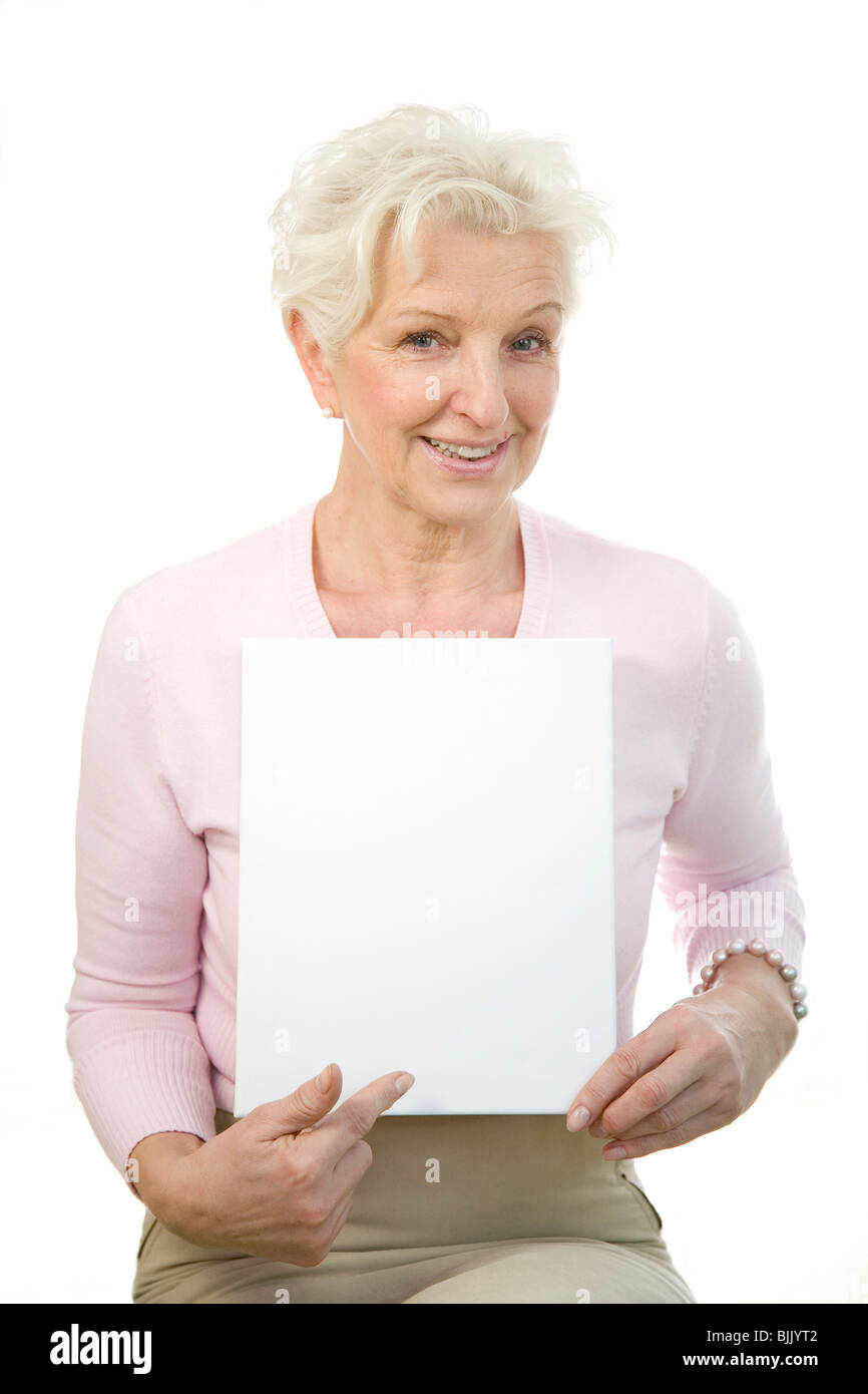 Woman holding up blank sign hi-res stock photography and images - Alamy