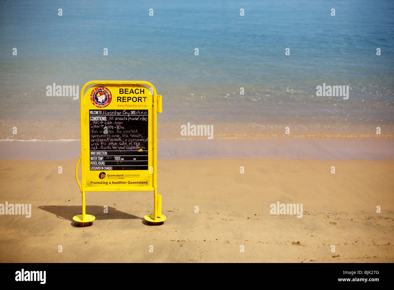 A beach safety sign on Horsehoe Bay on Fraser Island in Australia Stock ...