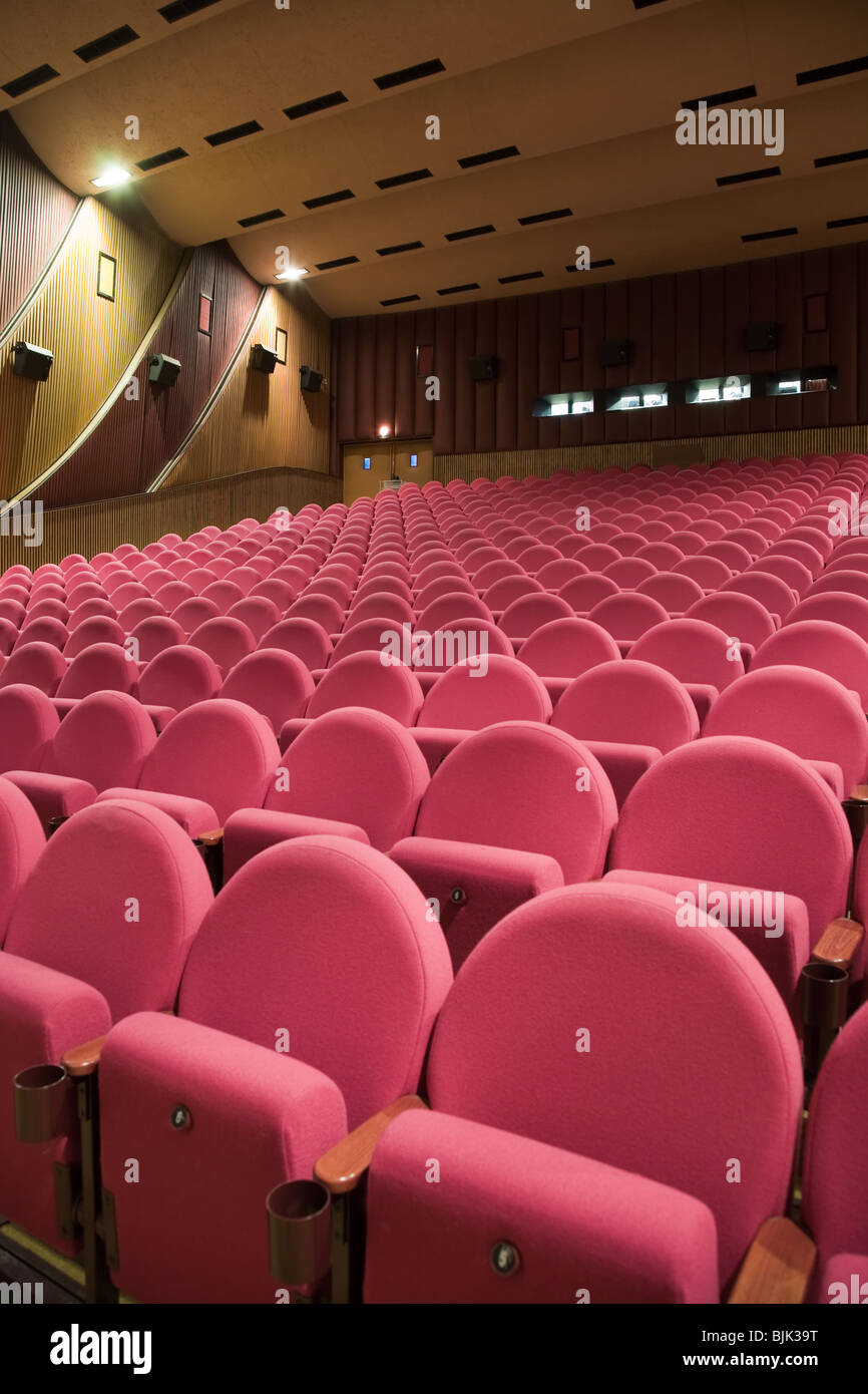Interior of cinema auditorium with walls and ceiling decoration and ...