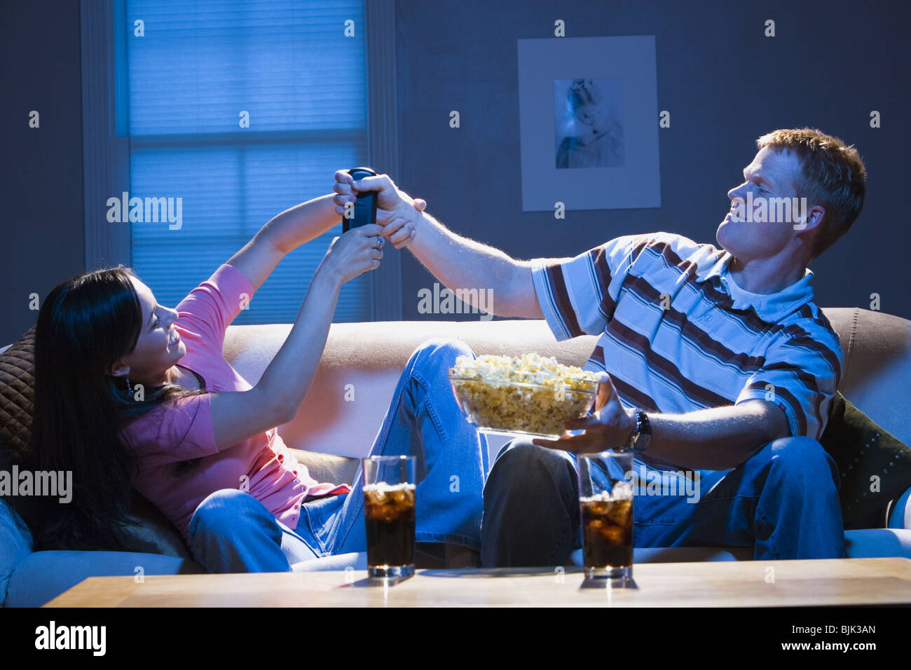 Couples fighting over tv remote hi-res stock photography and images - Alamy