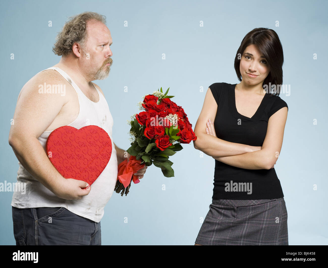 Disheveled man red roses heart hi-res stock photography and images - Alamy